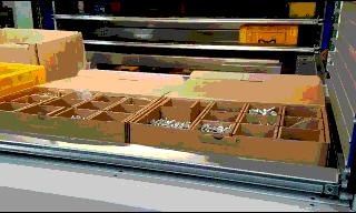 Application of Multiple Column VLM With Goods On Metal Trays